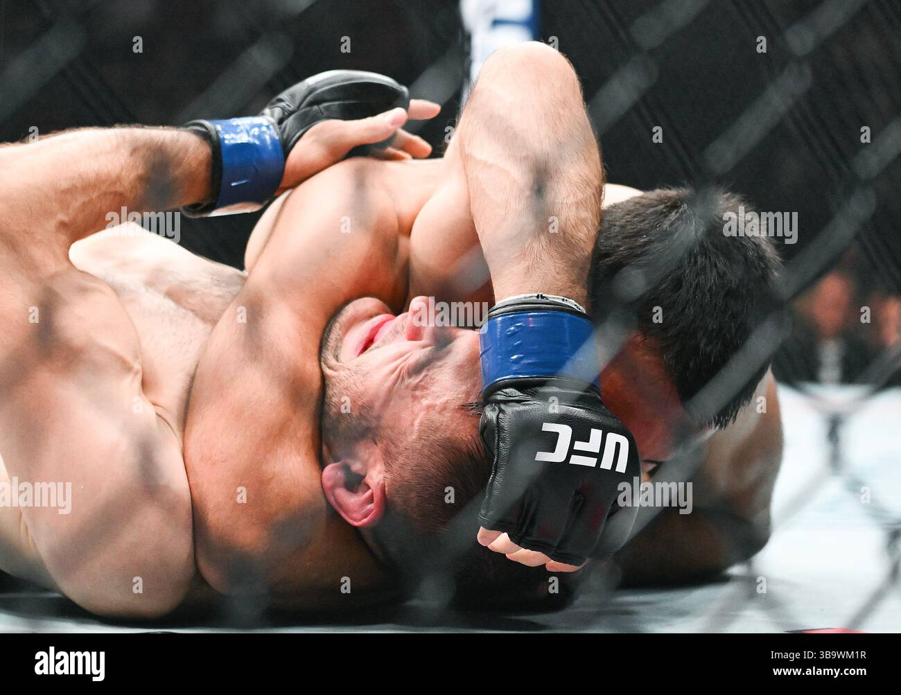 Montreal, Canada. 10th May, 2025. Kyle Prepolec, left, taps out to ...