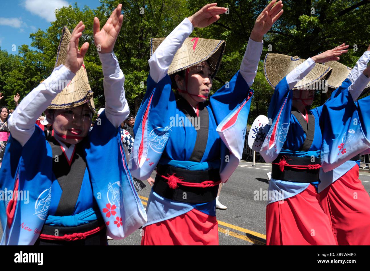 People dance and march while wearing kimonos in the Japan Parade. The ...