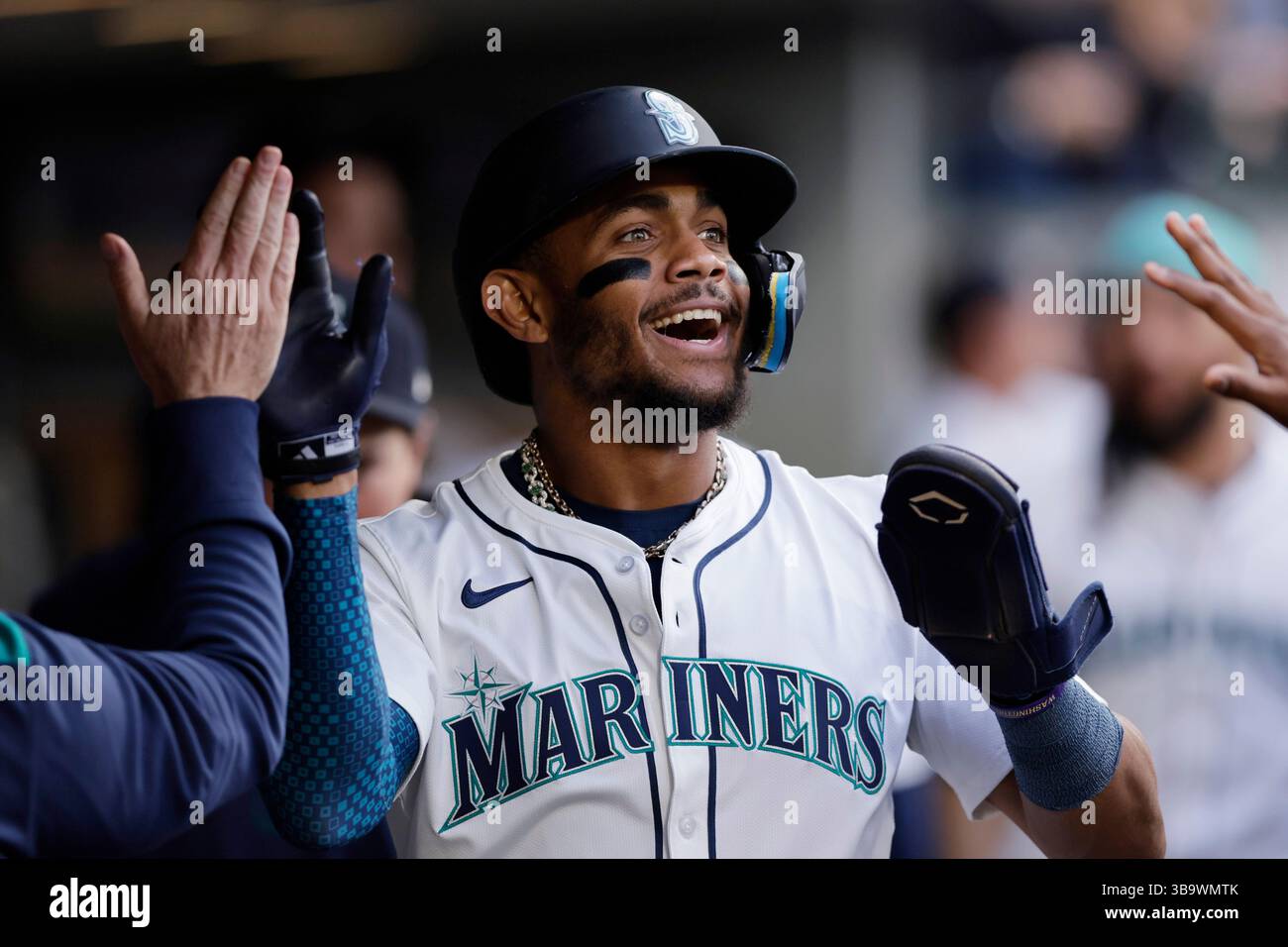 Seattle Mariners' Julio Rodríguez celebrates in the dugout after ...