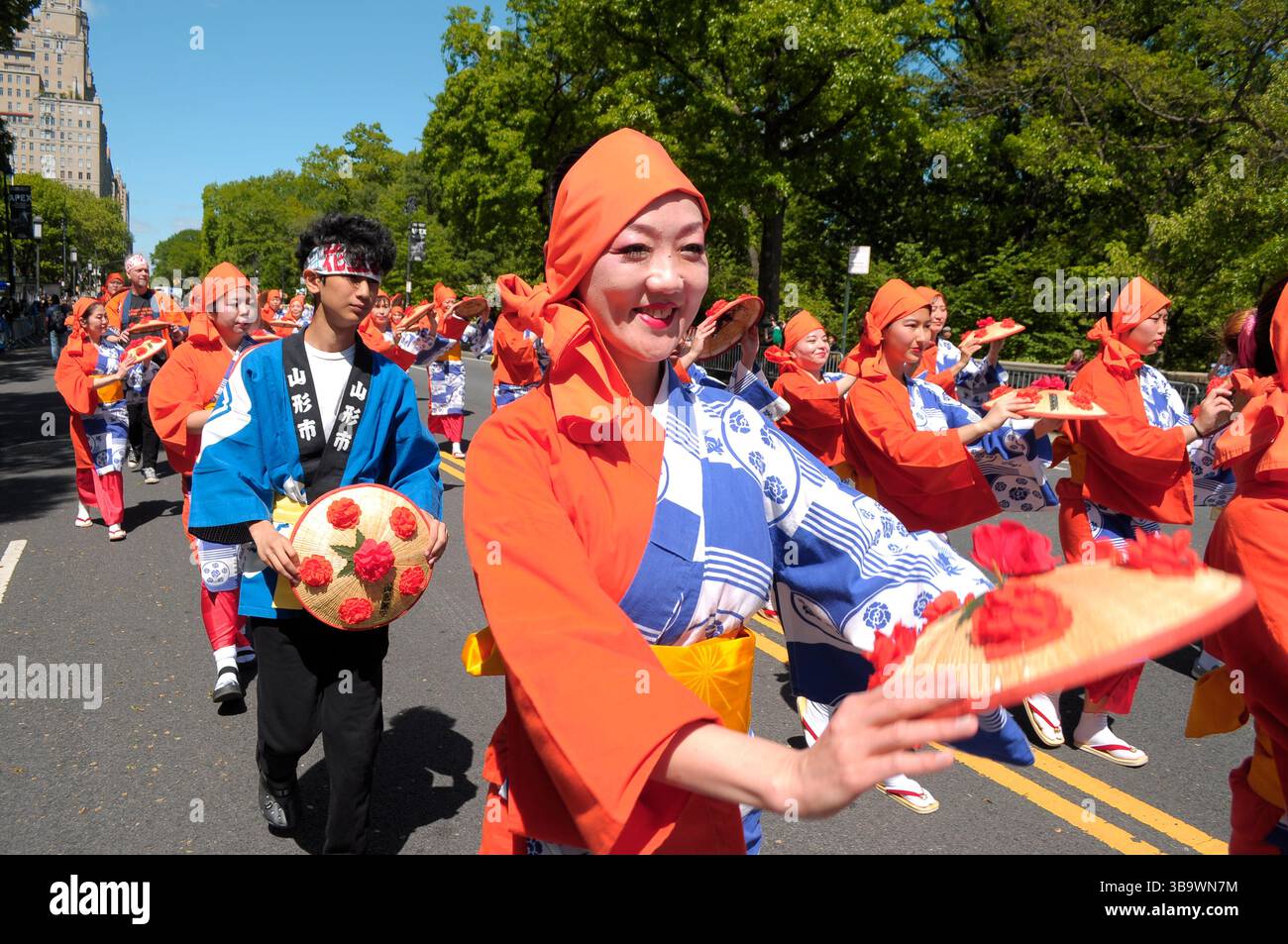 New York, United States. 10th May, 2025. People dance and march in the ...