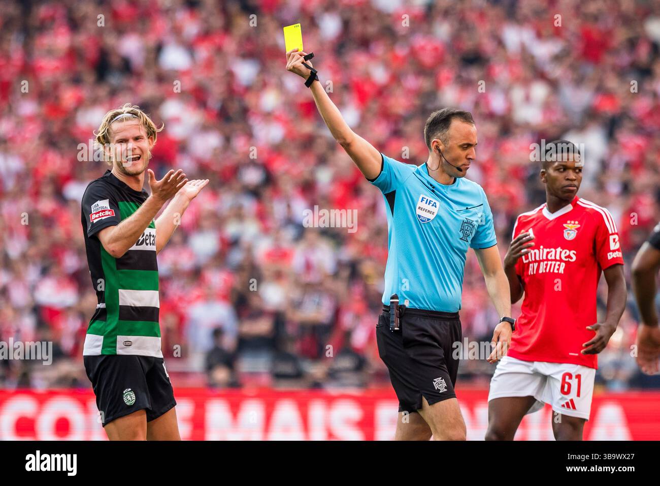 Lisbon, Portugal. 10th May, 2025. Referee, Joao Pinheiro, shows a ...