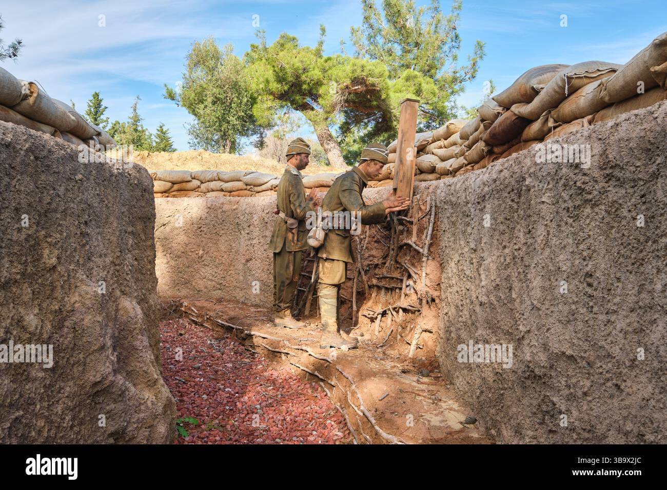 Turkish soldiers using a wood periscope tool to look over and above the ...