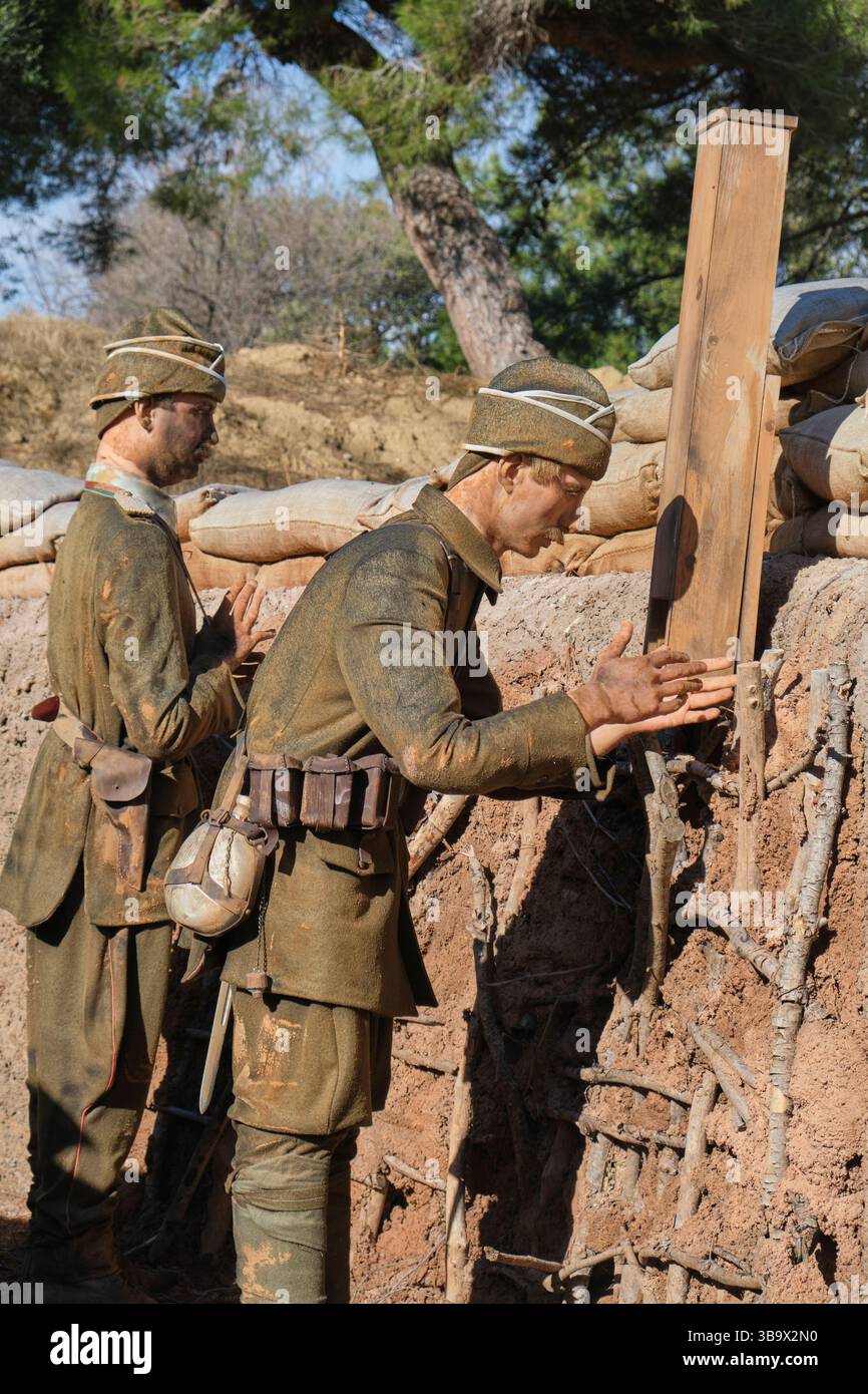 Turkish soldiers using a wood periscope tool to look over and above the ...