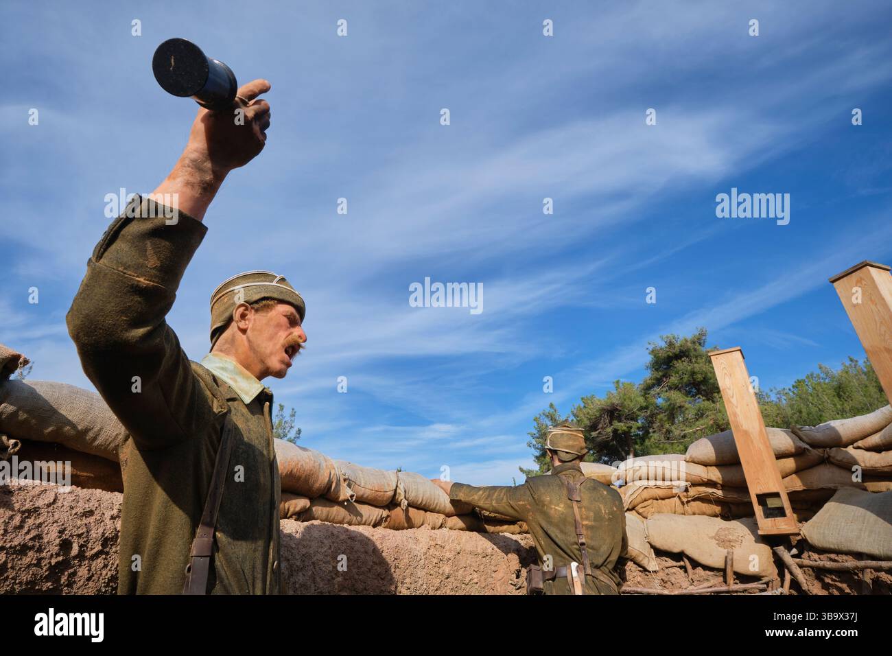 In a trench, a Turkish soldier is about to throw a hand grenade. At The ...