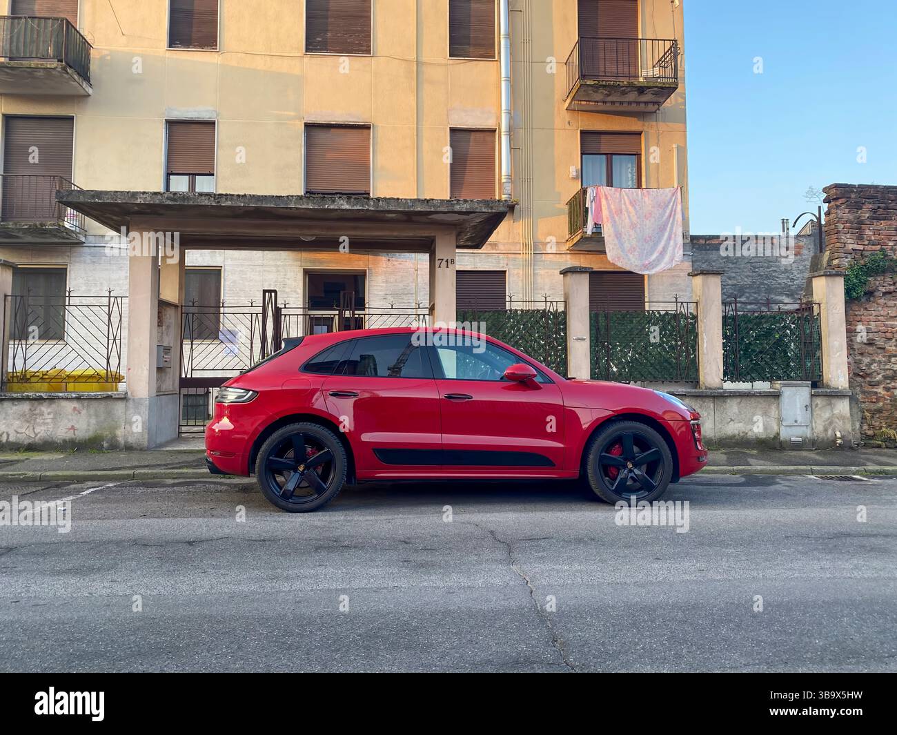 Cremona, Italy - April 5th 2025 Majestic Red Porsche Macan S on a Sunny ...