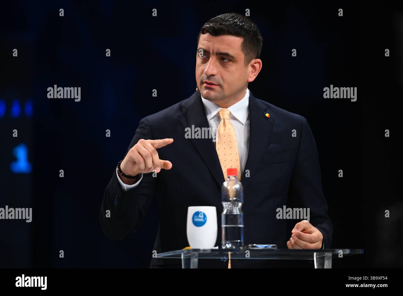 ROMANIA-POLITICS-VOTE-DEBATE AUR party leader George Simion attends a ...