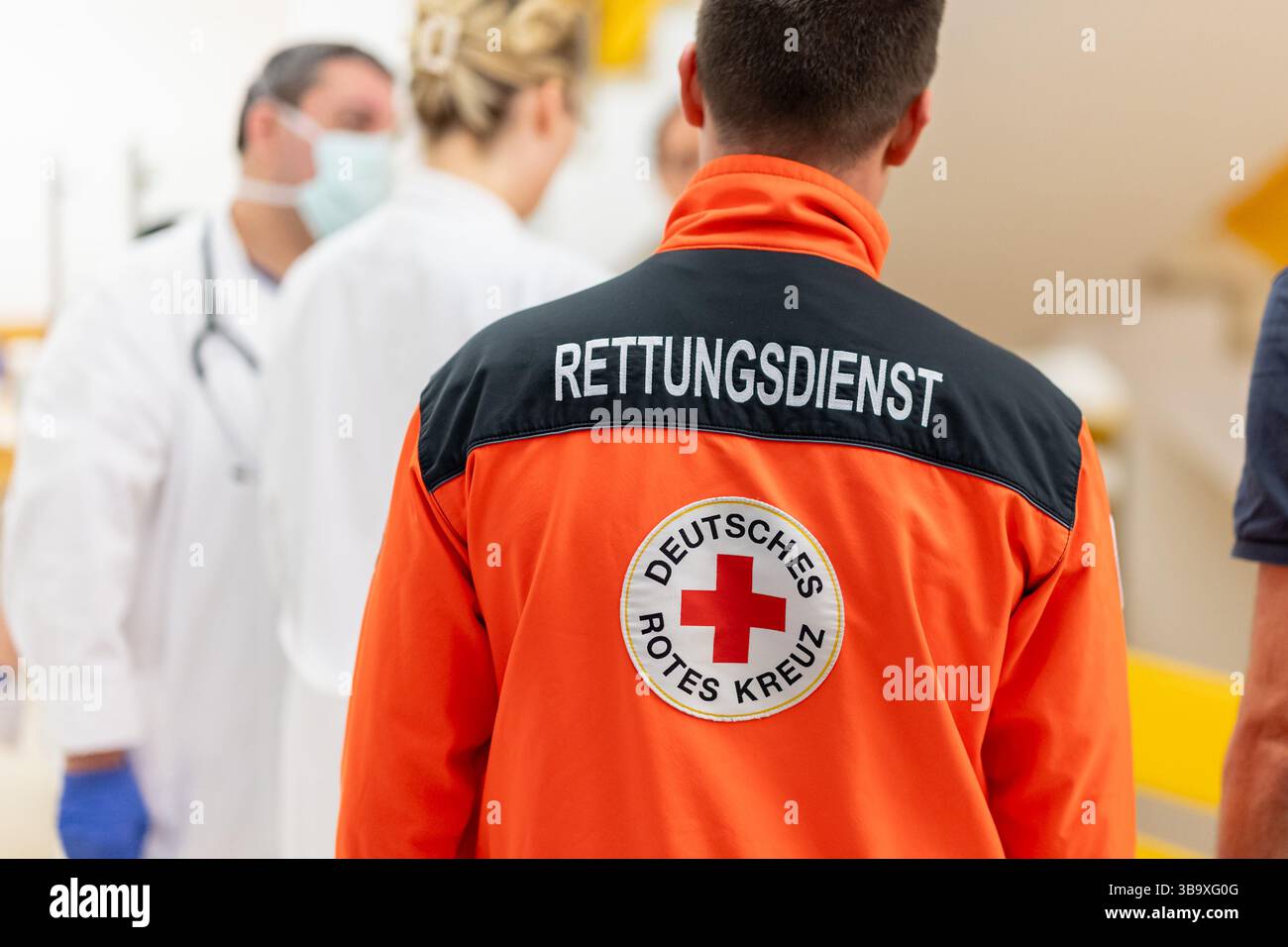10 May 2025, Bavaria, Erlangen: The badge of the German Red Cross can ...