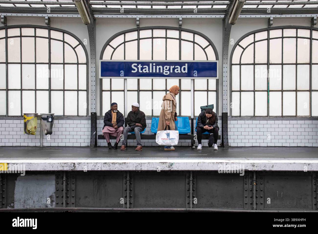 Passengers waiting for a train on the platform of Stalingrad above ...