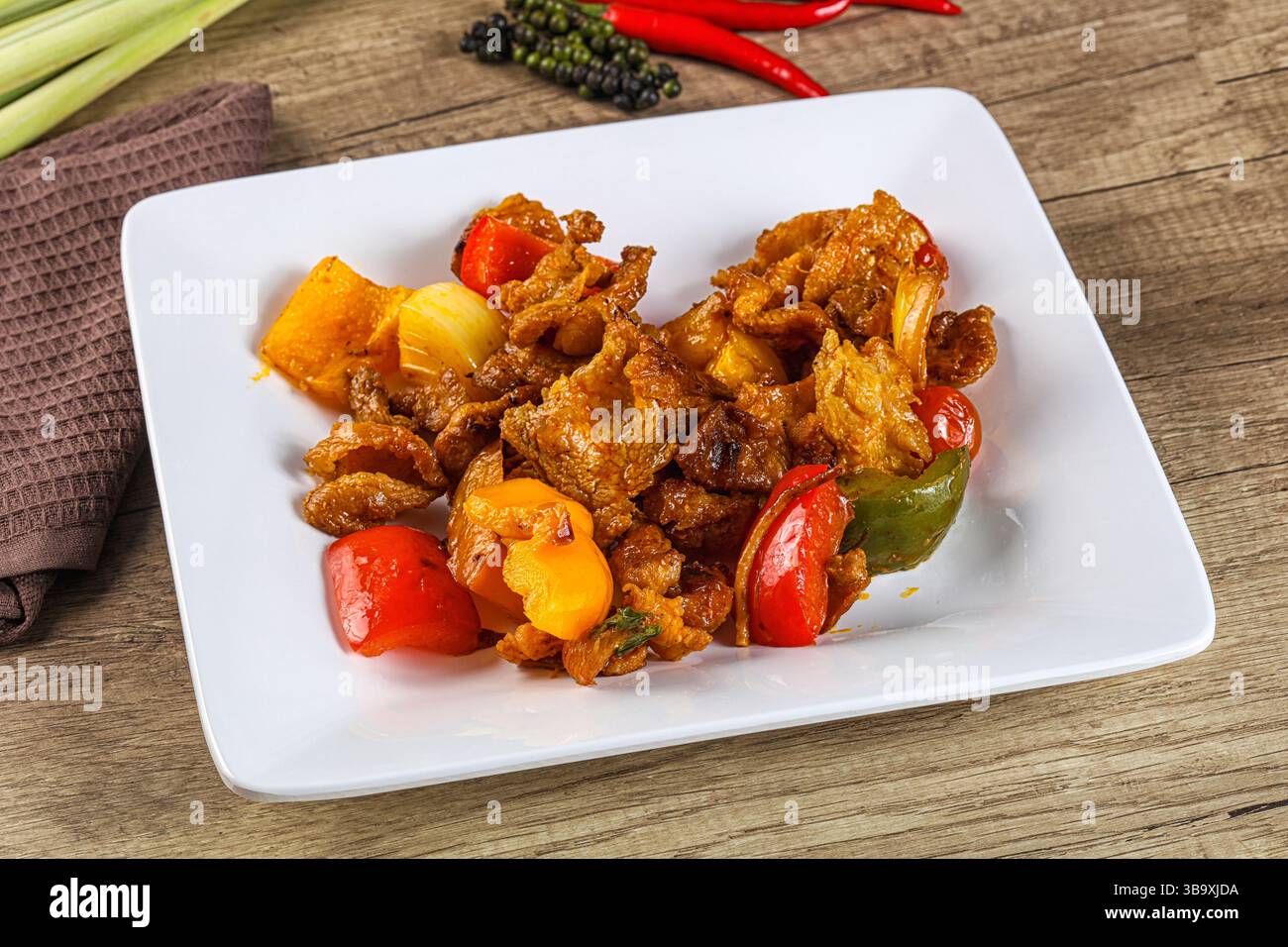 Asian cuisine - roasted crocodile meat with vegetables Stock Photo - Alamy