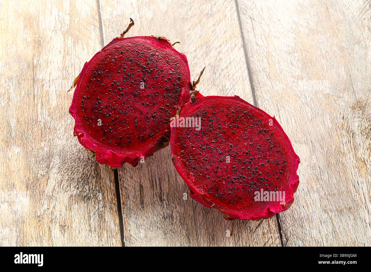 Raw sweet red dragon fruit - pitahaya Stock Photo - Alamy
