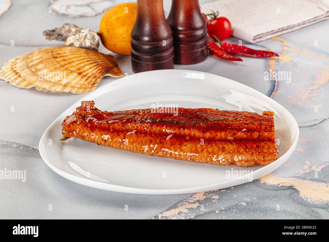 Smoked unagi eel fish in sause Stock Photo - Alamy