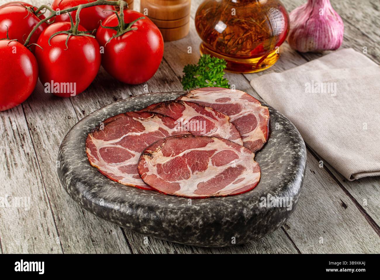 Italian Cured pork neck slices Coppa Stock Photo - Alamy