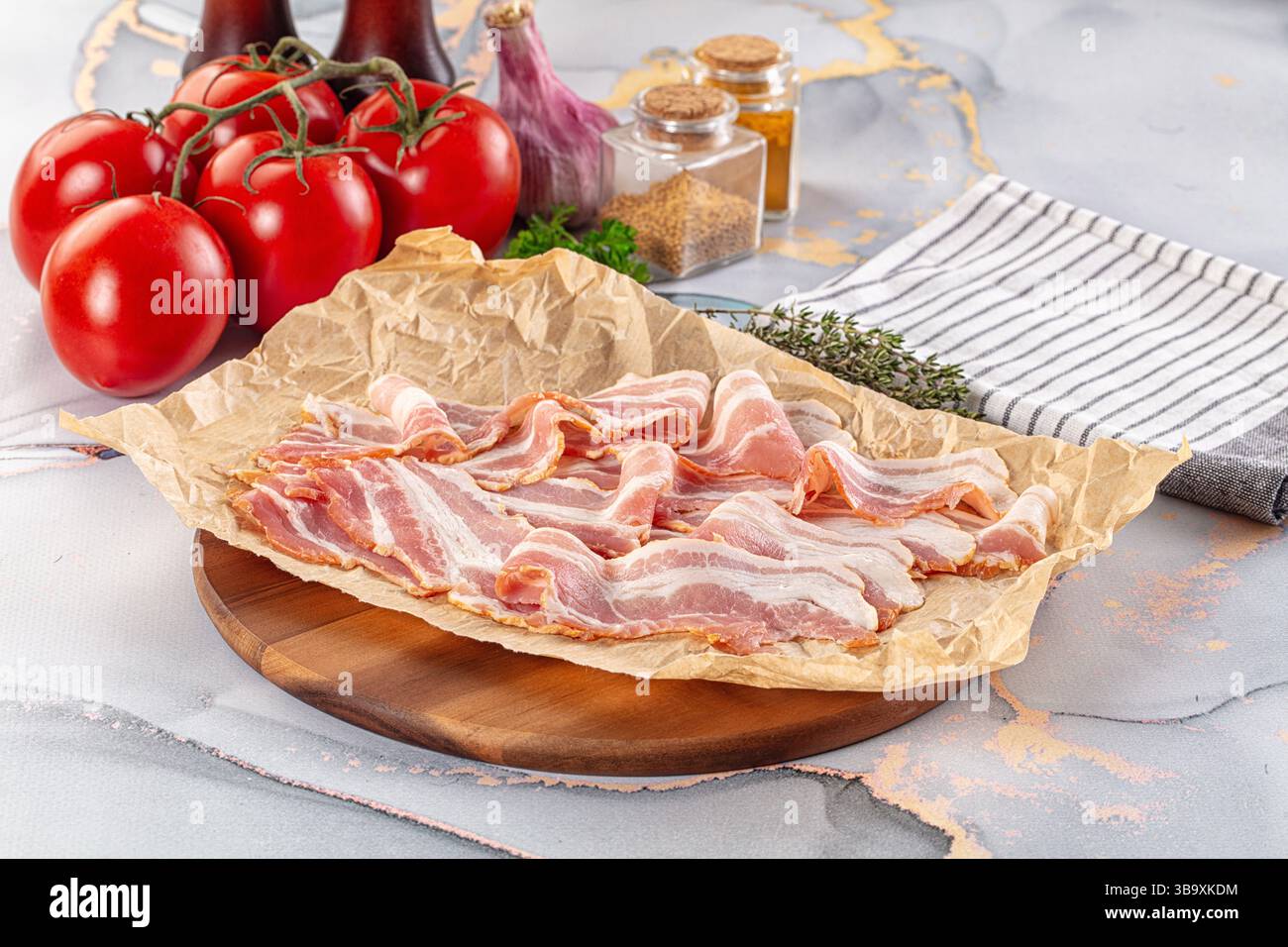 Sliced smoked pork bacon over board Stock Photo - Alamy