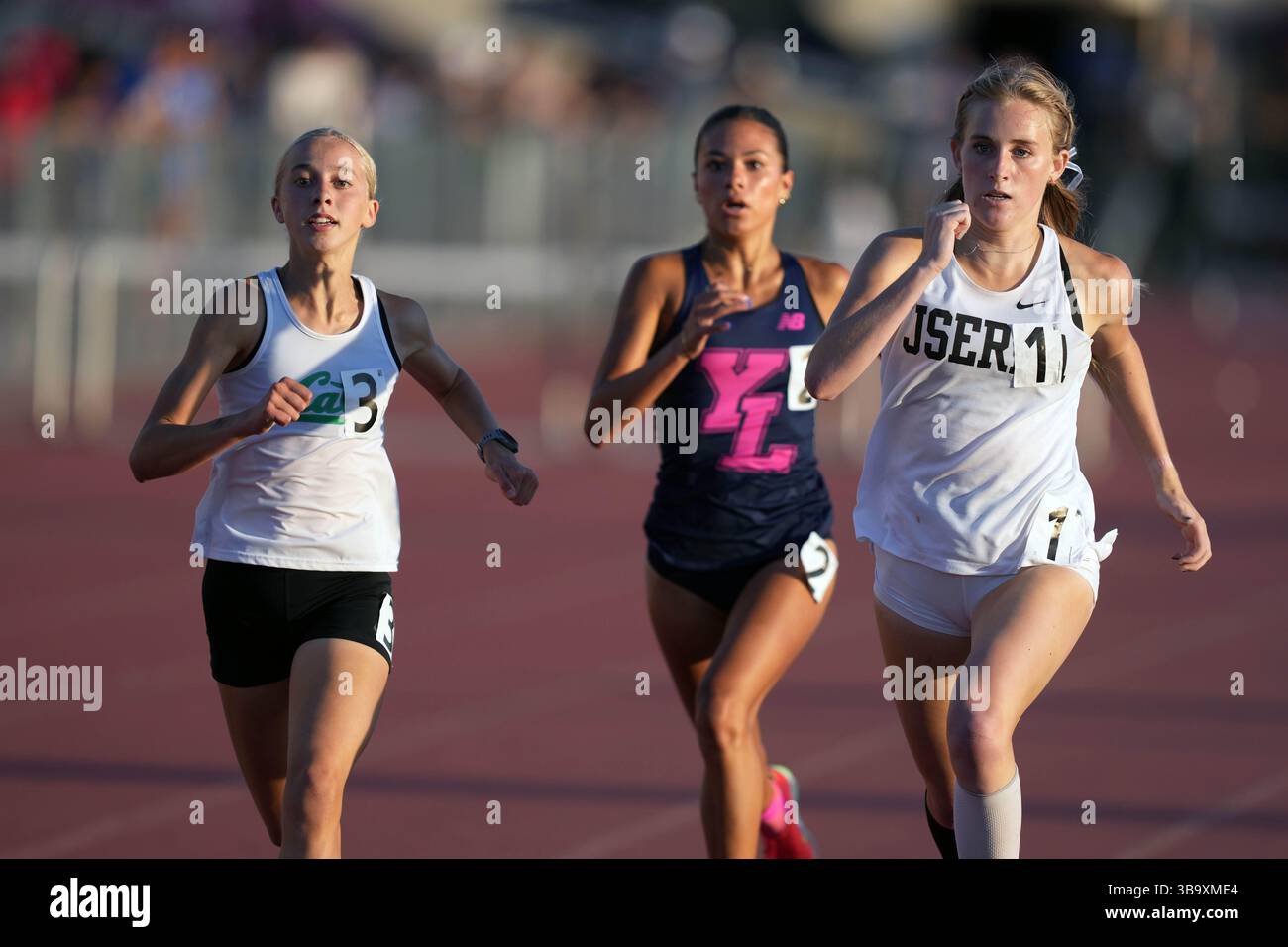 Anne Elise Packard of JSerra (right) defeats Isla Terrill of Monrovia to win girls 800m heat, 2: ...