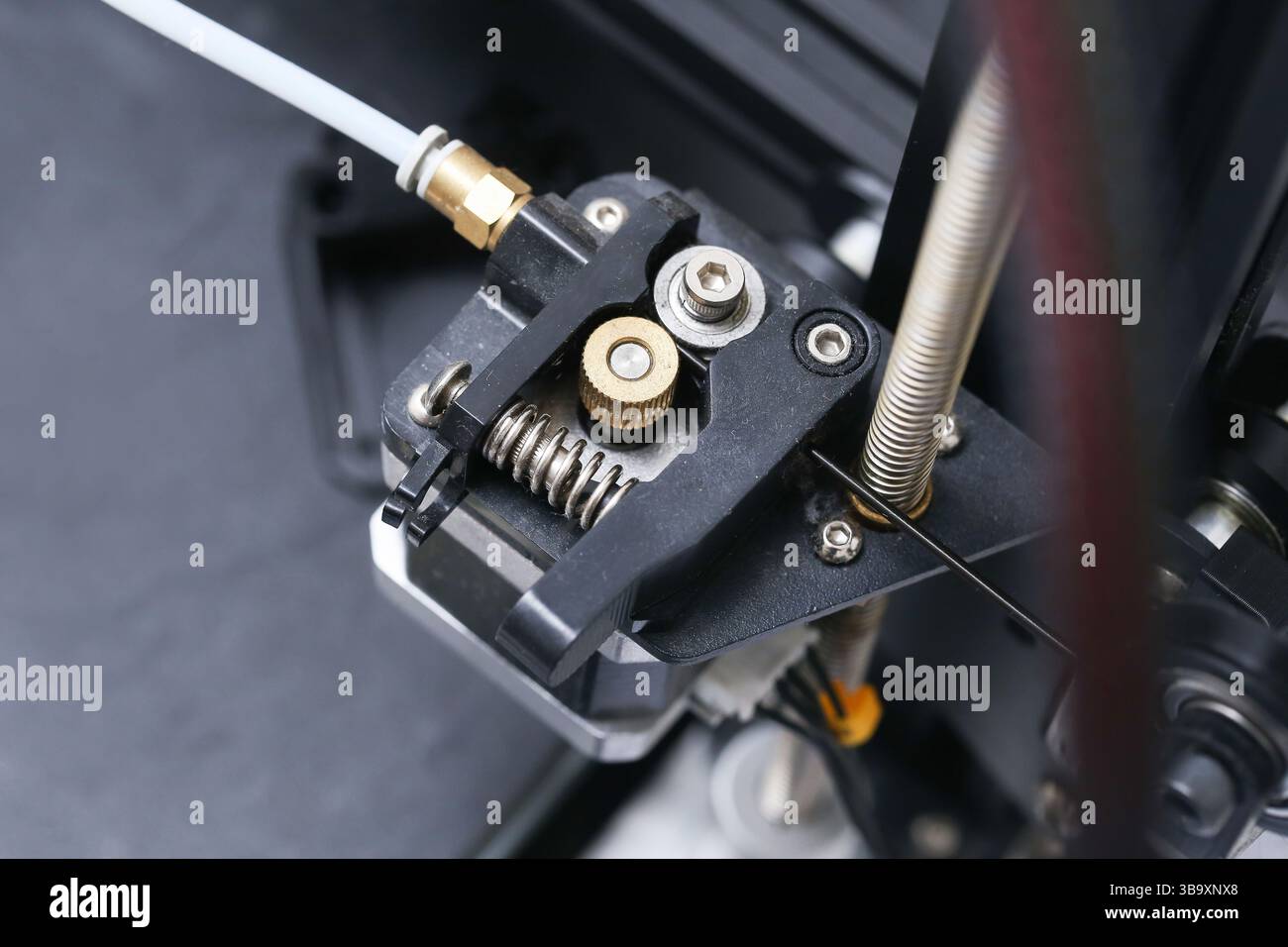 3D printer extruder closeup. Stepper motor with gear. Filament feed ...