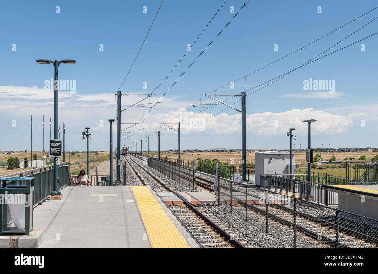 Train and passengers Approaching 40th Ave and Airport Boulevard Gateway ...