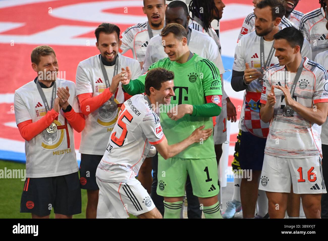 Munich, Deutschland. 10th May, 2025. Thomas MUELLER (M?LLER, FC Bayern Munich) with Manuel NEUER ...