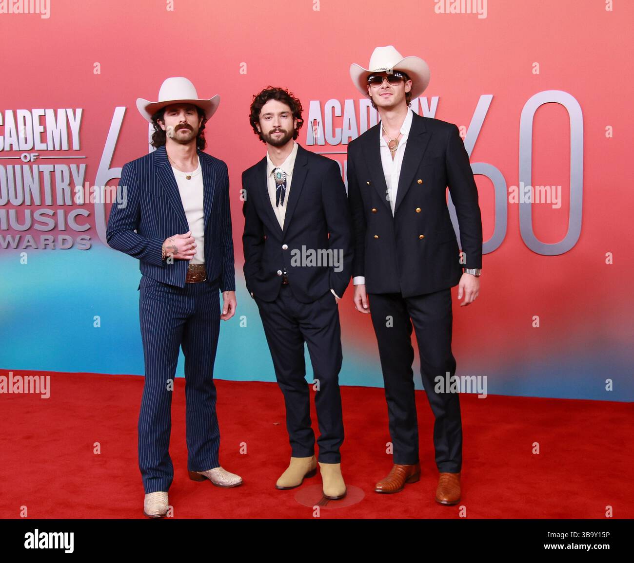 Colton Pack, Garrett Nichols, and Zach Beeken of Restless Road attend ...