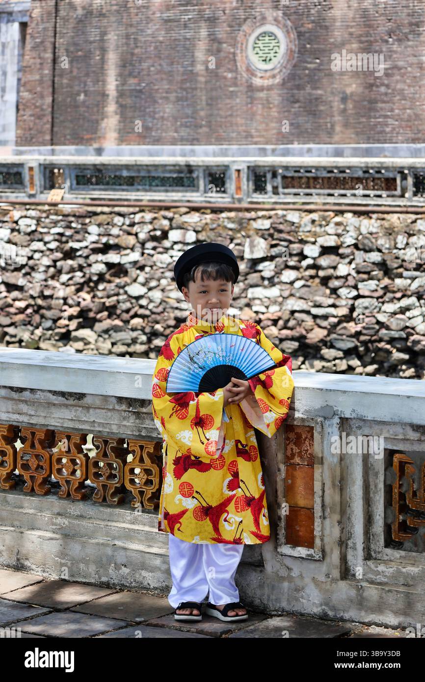 Hue, Vietnam - August 26, 2023: Vietnamese children wear traditional ...