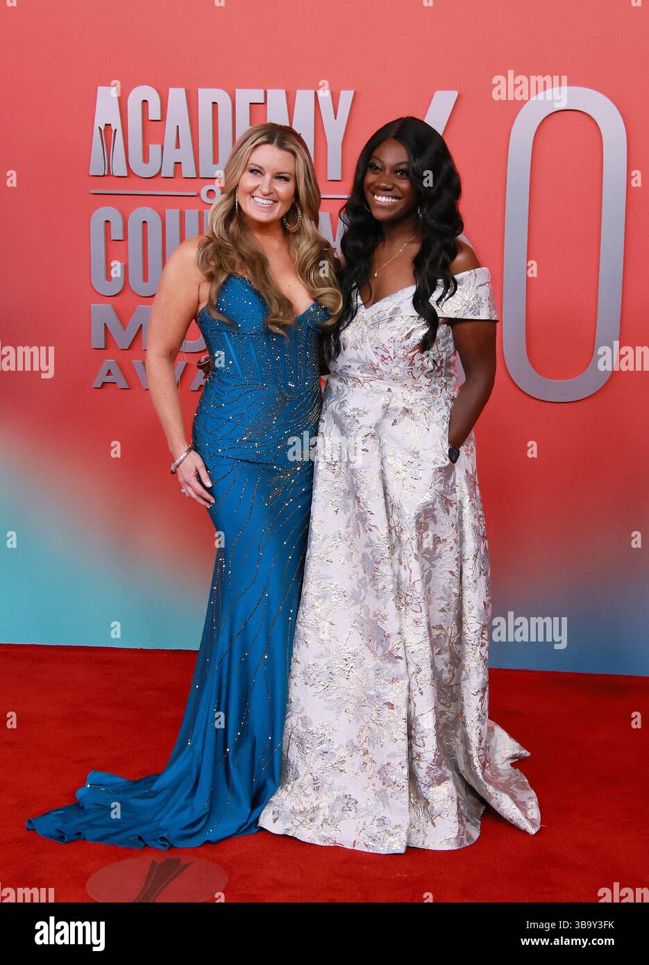 Kelly Sutton, Amber Anderson attend the 60th Academy of Country Music ...