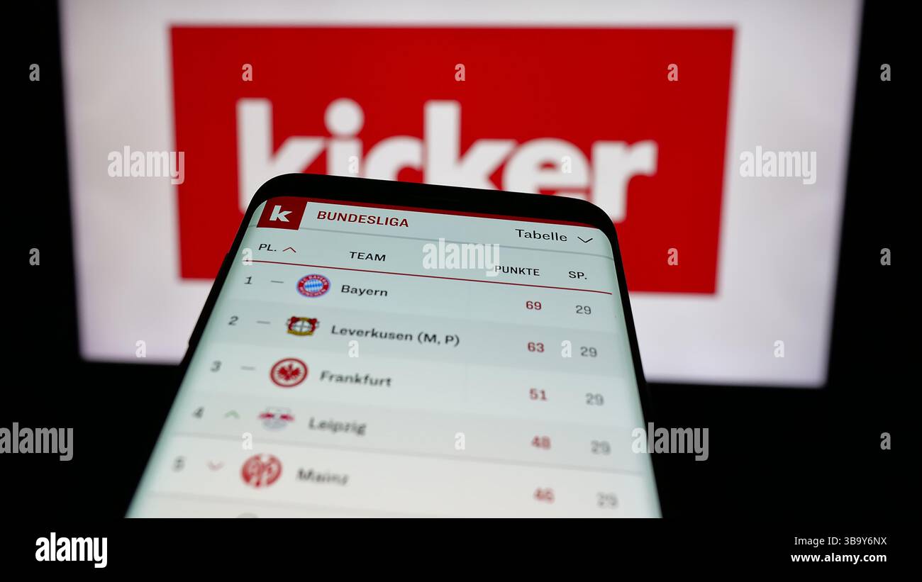 In this photo illustration, a mobile phone with the webpage of German ...