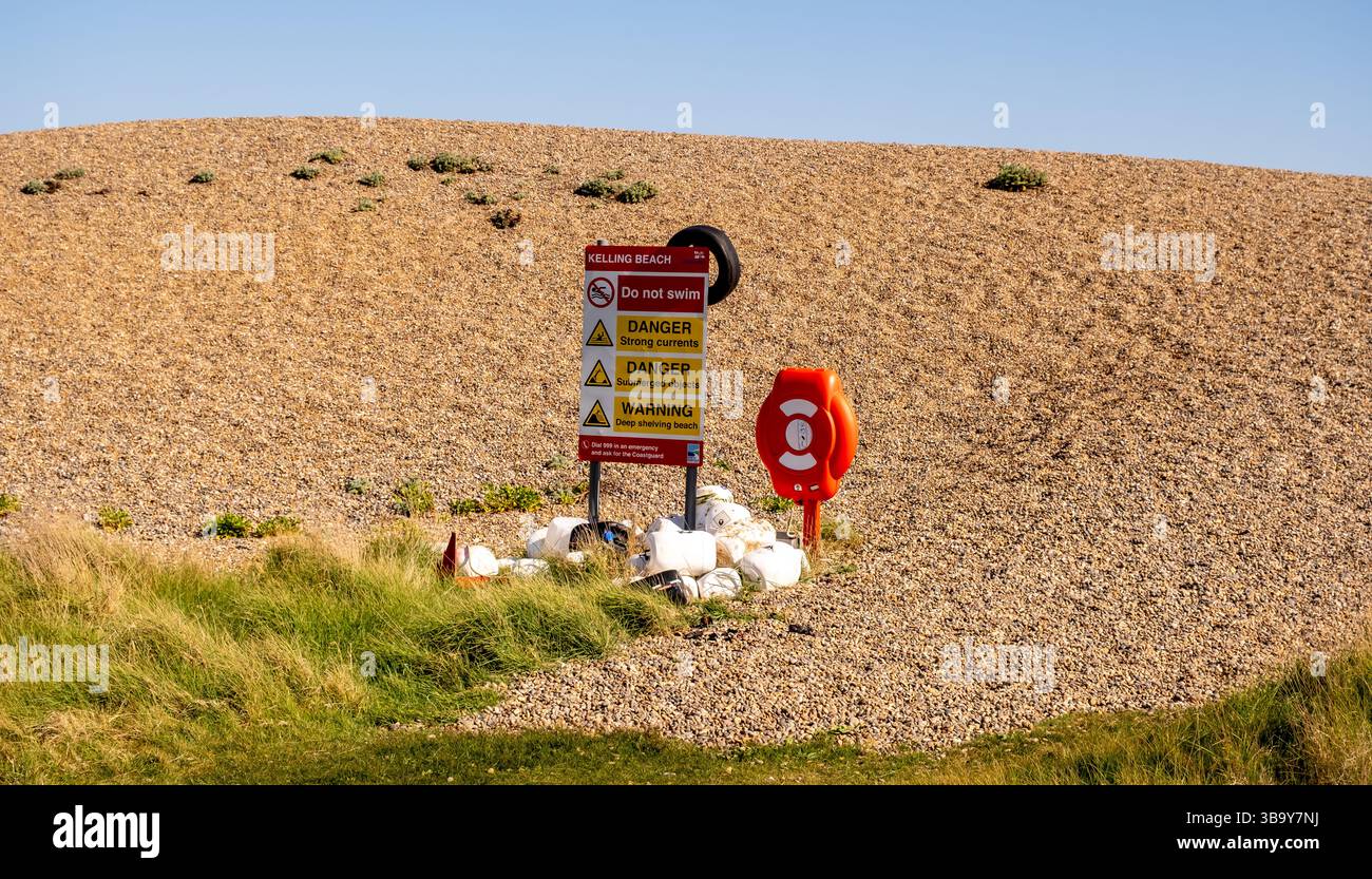 Weybourne, Norfolk, UK – May 10 2025. Warning sign at Kelling beach ...