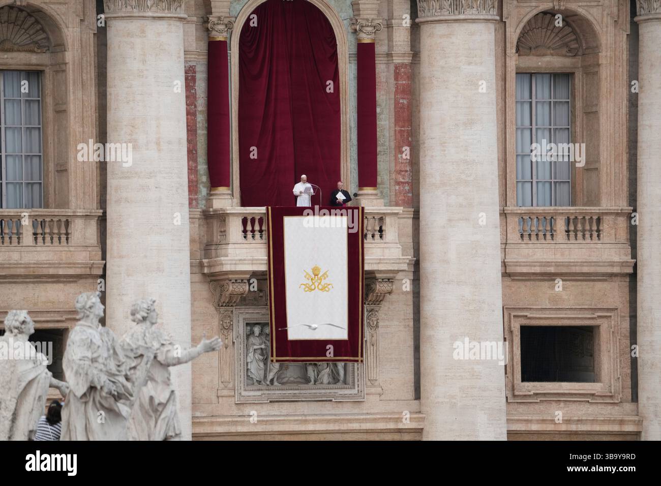 Pope Leo XIV appears at the central balcony of St. Peter's Basilica for ...