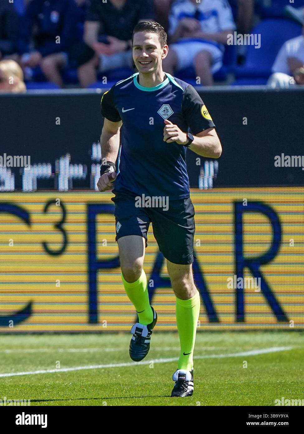 ZWOLLE, NETHERLANDS - MAY 11: Assistant referee Dyon Fikkert warms up ...