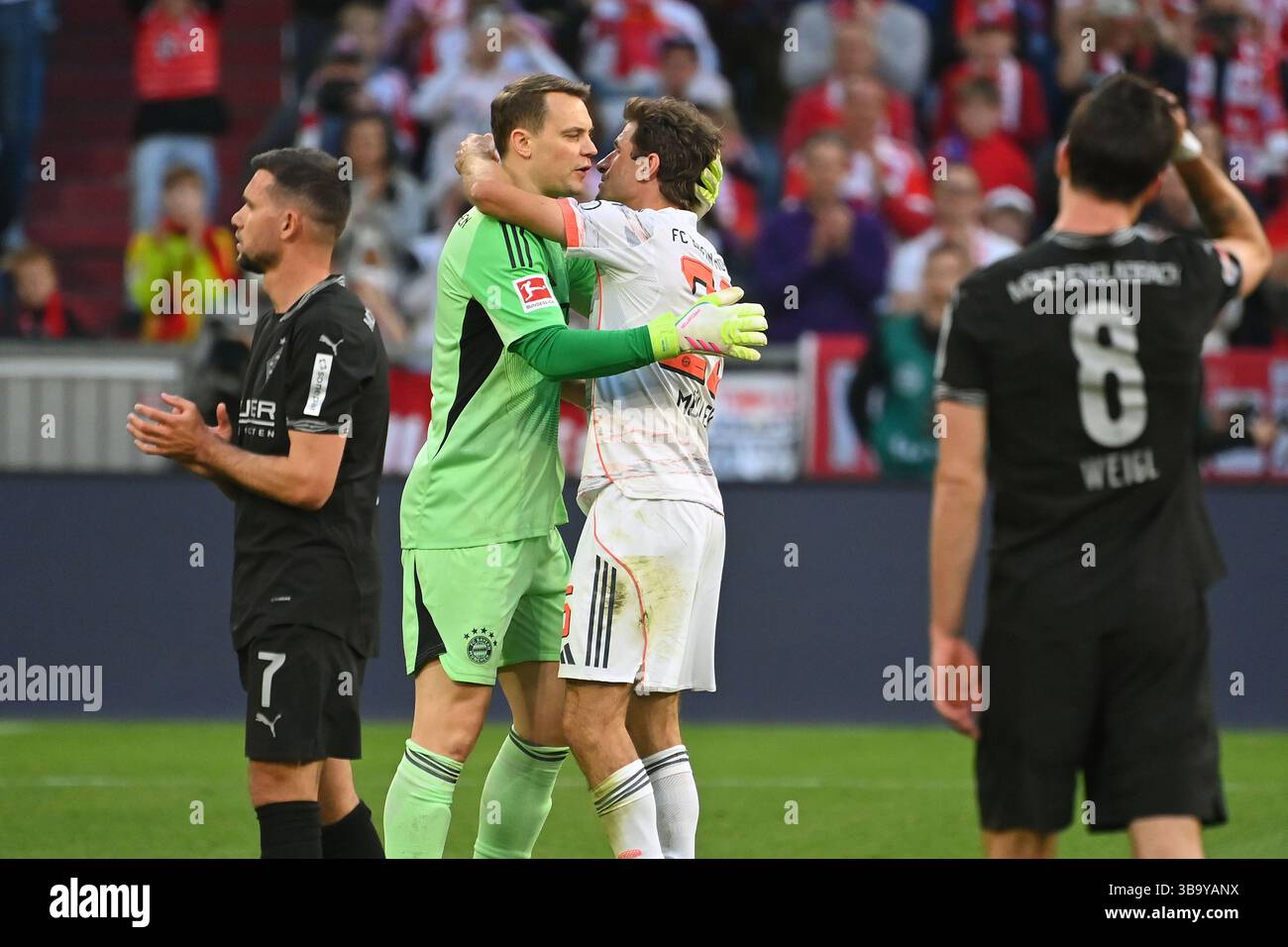Munich, Deutschland. 10th May, 2025. Thomas MUELLER (M?LLER, FC Bayern Munich) with Manuel NEUER ...