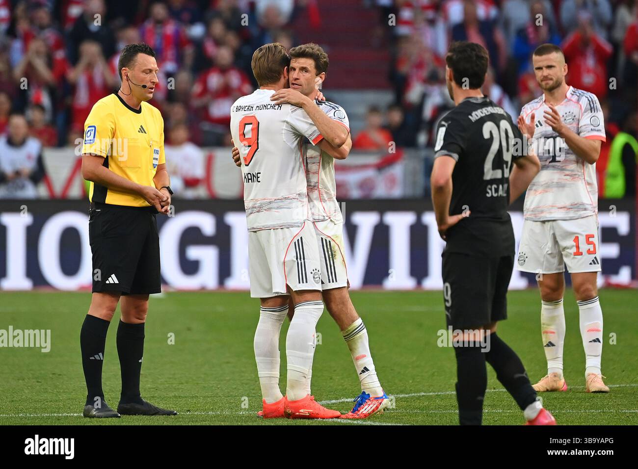 Munich, Deutschland. 10th May, 2025. Thomas MUELLER (M?LLER, FC Bayern Munich) with Harry KANE ...