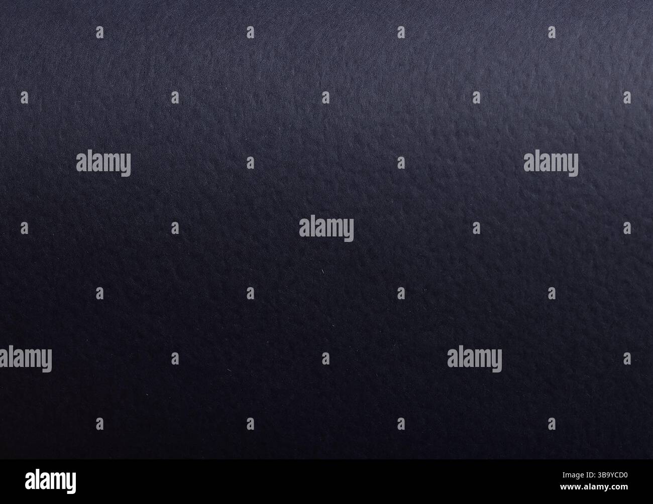 Paper texture with dark blue tone, clean matte surface and perforated ...