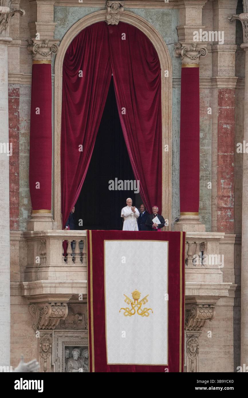 Pope Leo XIV appears at the central balcony of St. Peter's Basilica for ...