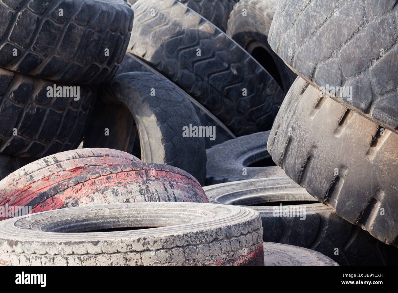 Pile old tyres used hi-res stock photography and images - Alamy