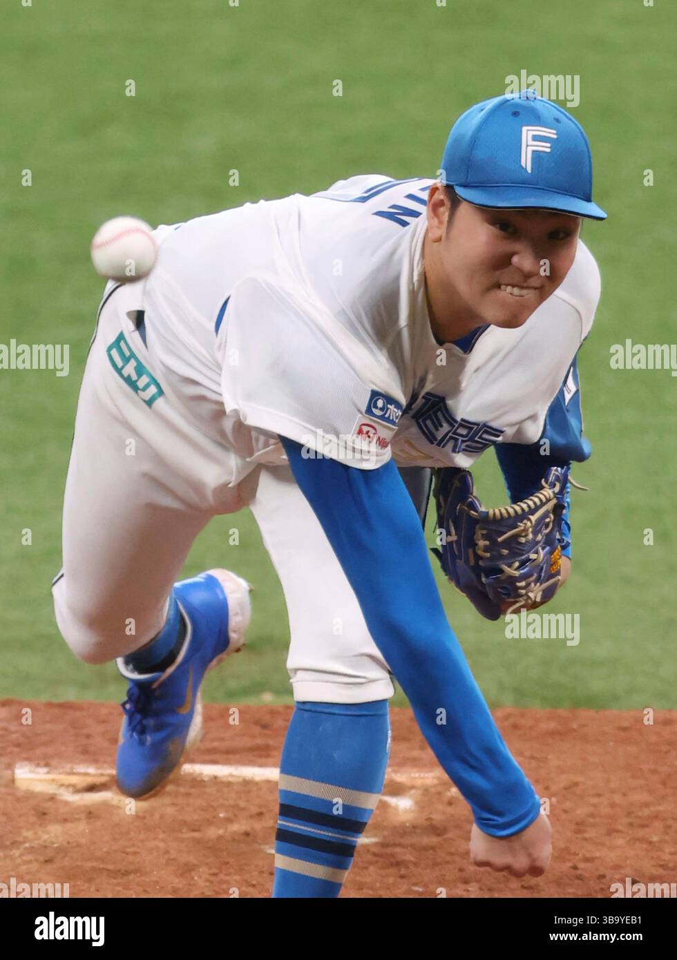 Taiwanese pitcher GU LIN RUEI-YANG of the Nippon Ham Fighters pitches ...