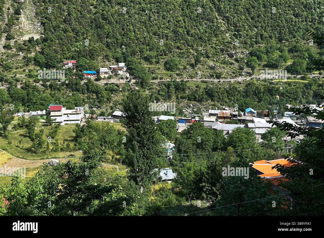 Villages of Pakistan side, bottom and Indian side Kashmir, are seen ...