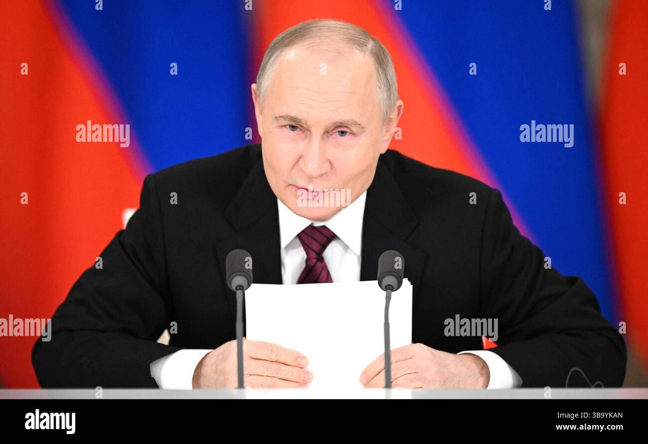 Russian President Vladimir Putin delivers a press statement at the ...