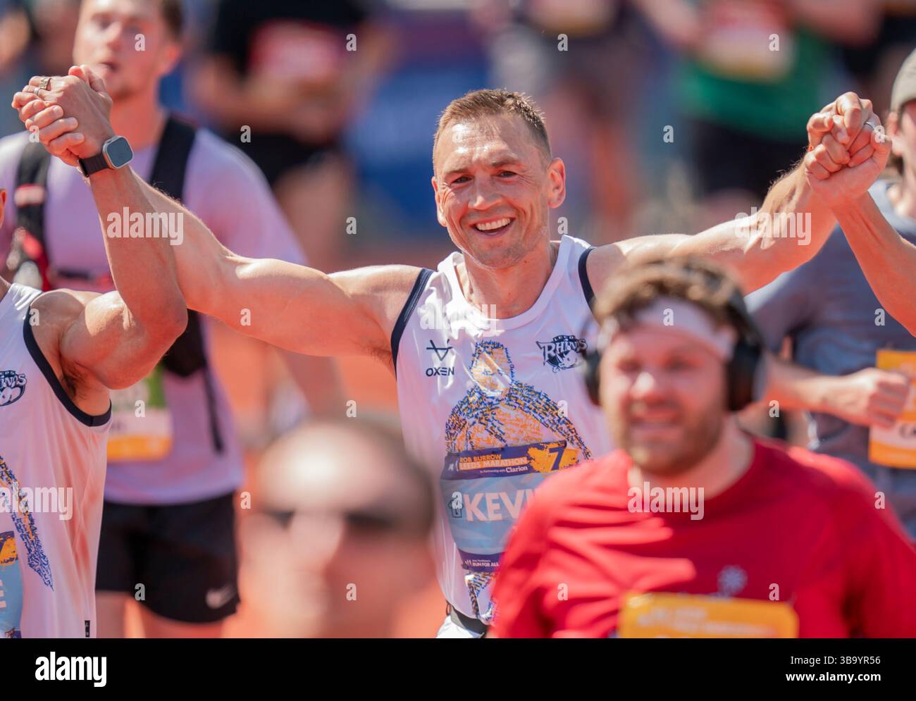 Kevin Sinfield crosses the finish line during of the Rob Burrow Leeds ...