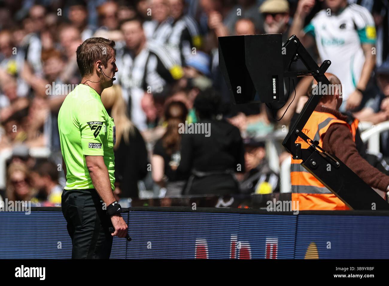 Newcastle, UK. 11th May, 2025. Referee John Brooks checks the VAR ...
