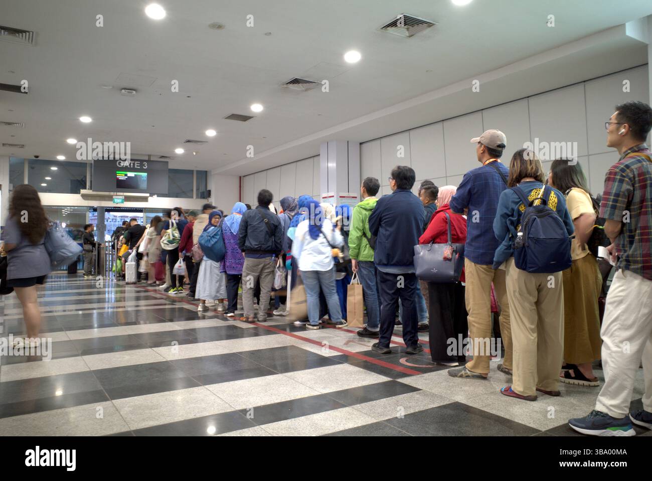 Singapore - 29 November 2024: Queue of people at the port in Singapore ...