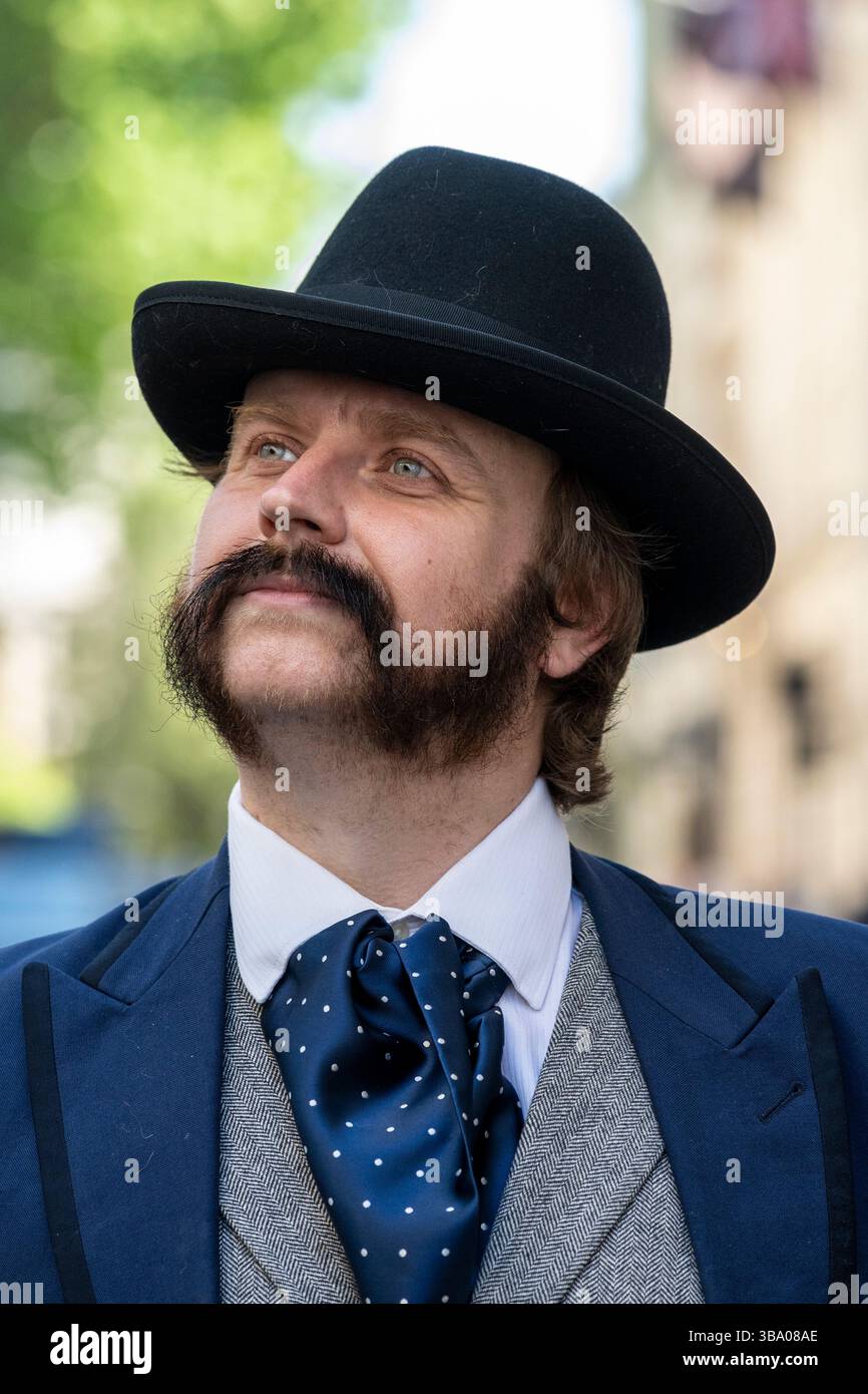 London, UK. 11 May 2025. An elegantly dressed man takes part in the ...