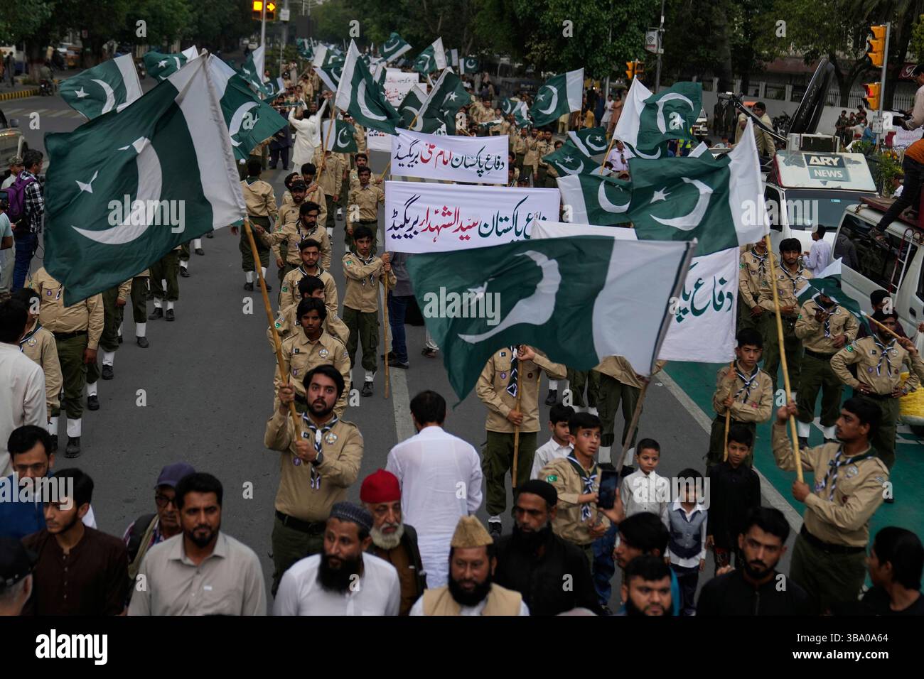 People with national flags take part in a rally to show solidarity with ...