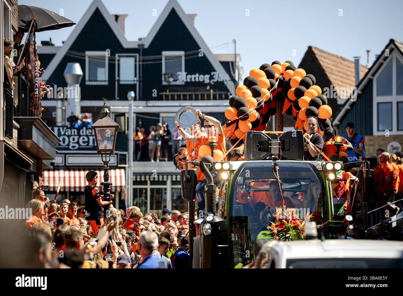 VOLENDAM - FC Volendam players on the flat cart during the homage ...