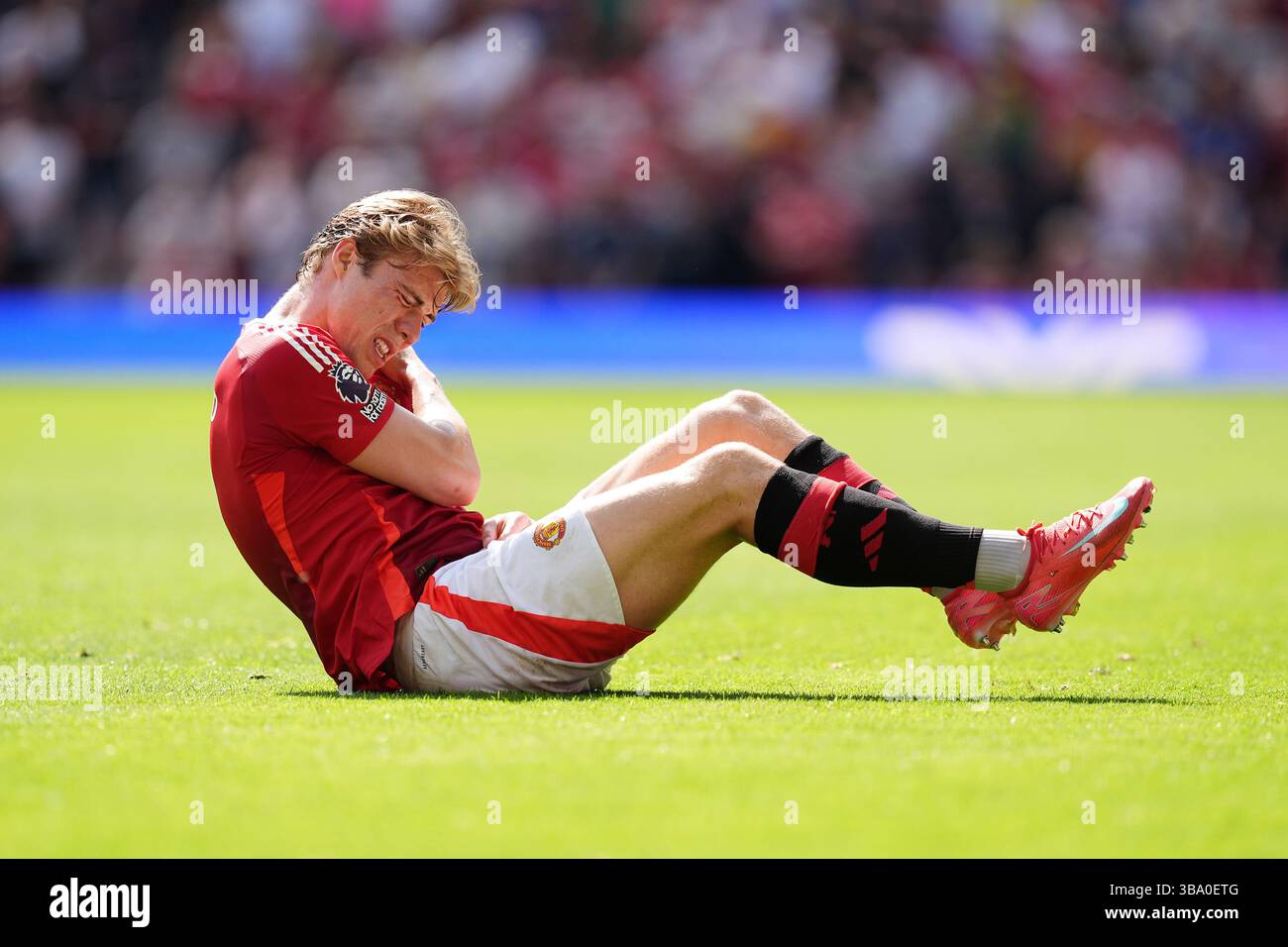 Manchester United's Rasmus Hojlund goes down injured during the Premier ...