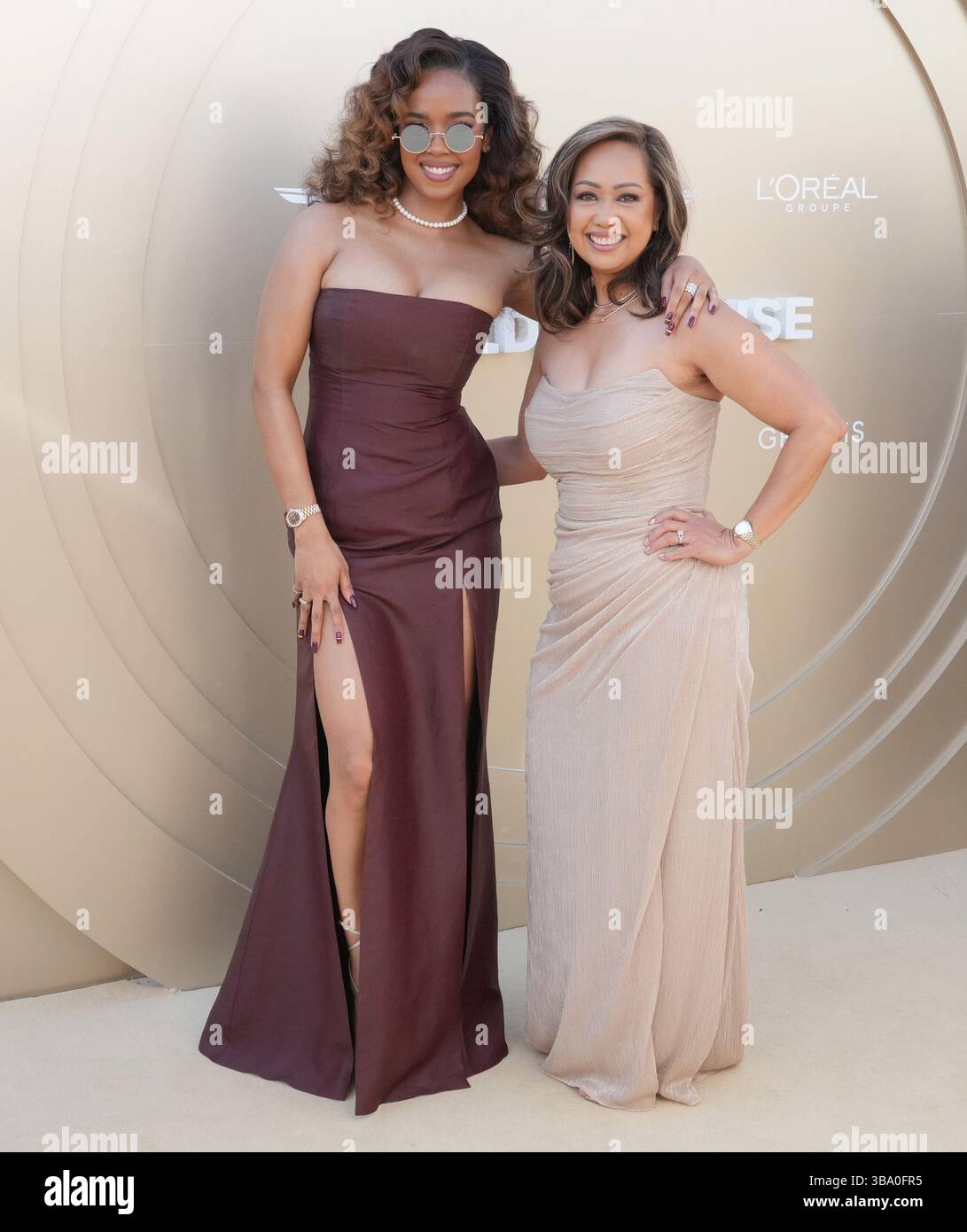 (L-R) H.E.R. and Mom Agnes Wilson at the Gold House 4th Annual GOLD ...