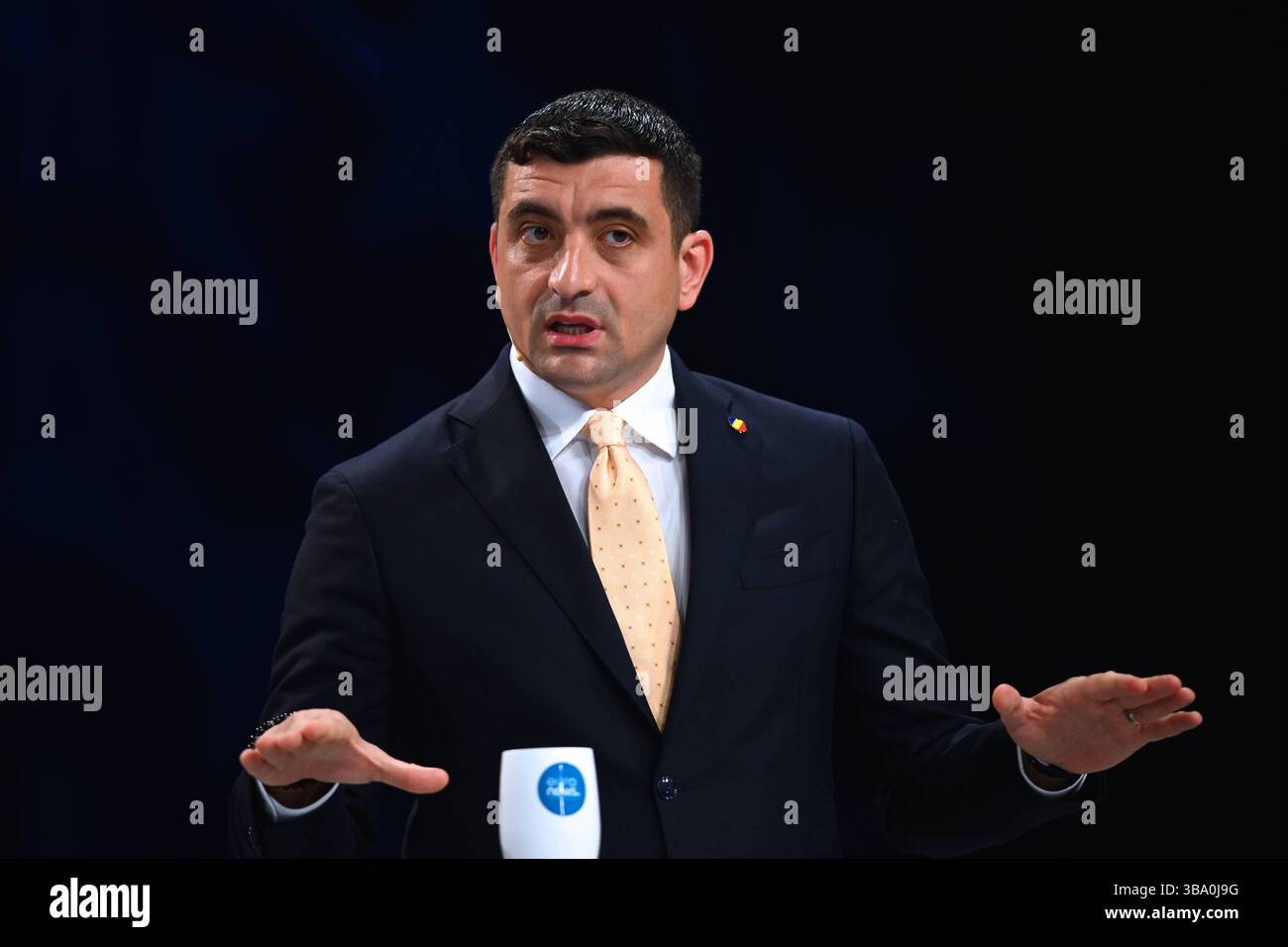 ROMANIA-POLITICS-VOTE-DEBATE AUR party leader George Simion attends a ...