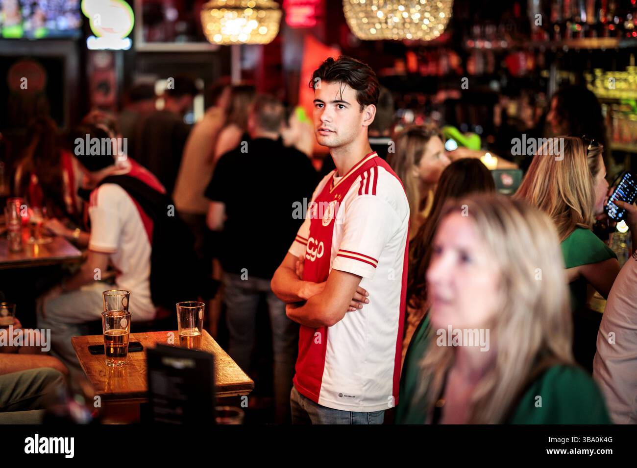 AMSTERDAM - Ajax fans follow the premier league match between Feyenoord ...