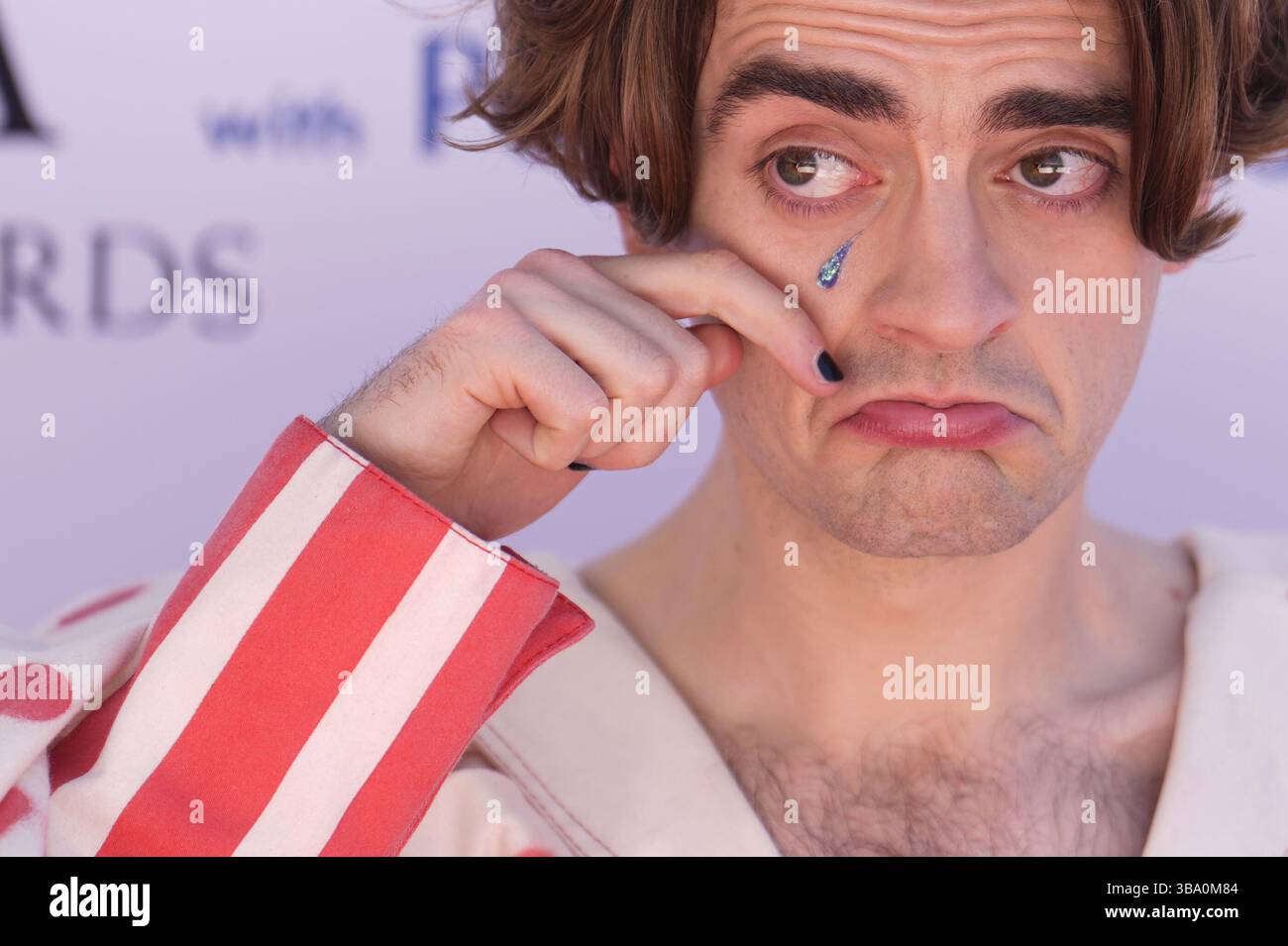 Luke Rollason attending the 2025 BAFTA Television Awards with P&O ...