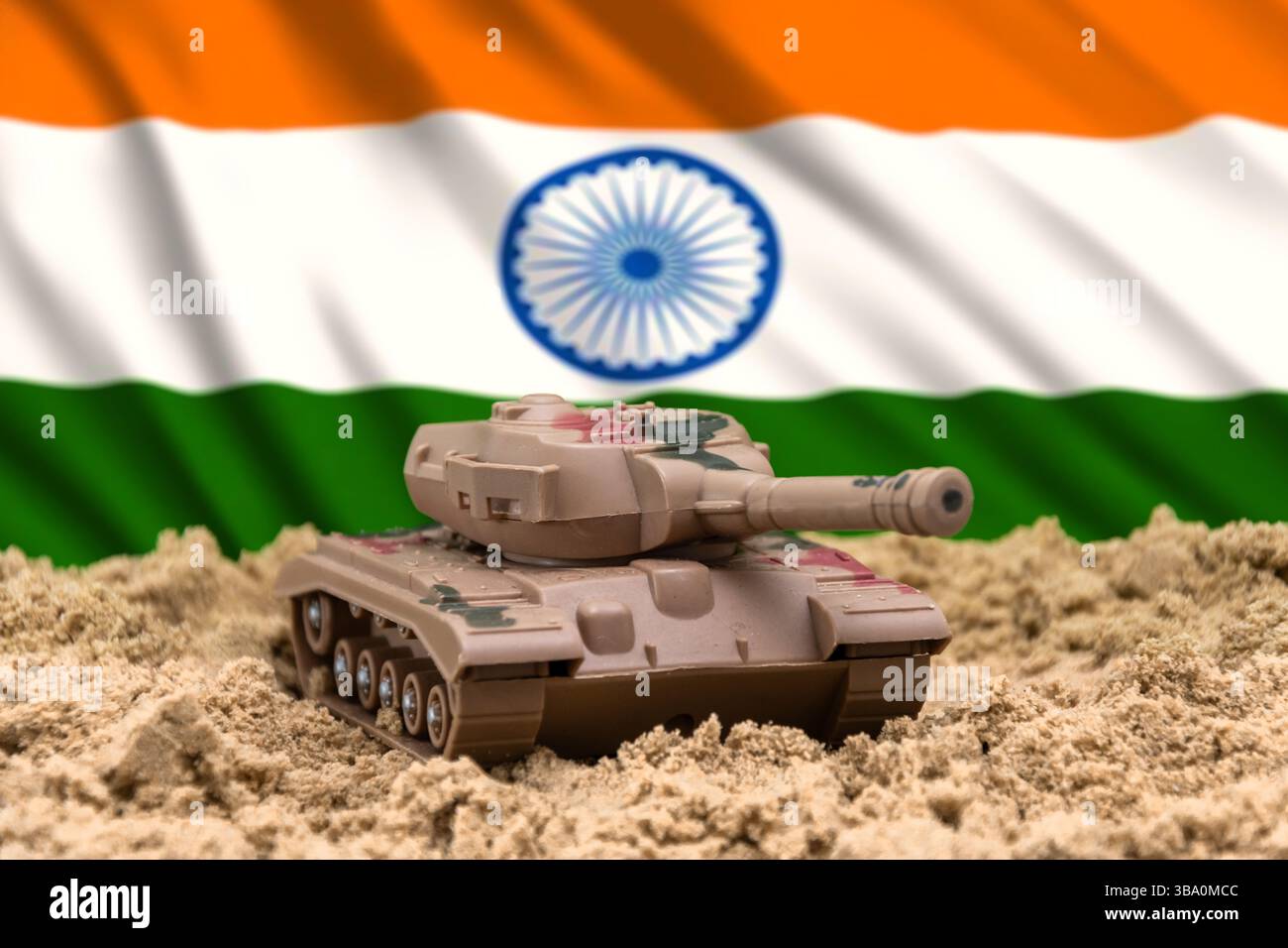 Military tank in desert terrain with Indian flag in background, concept ...