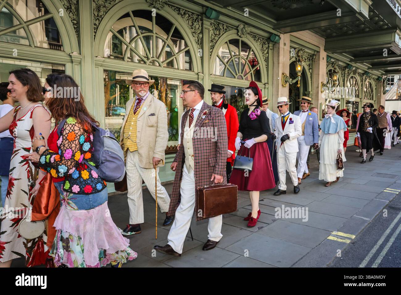 London, UK. 11th May, 2025. The participants walk past Fortnum & Mason ...