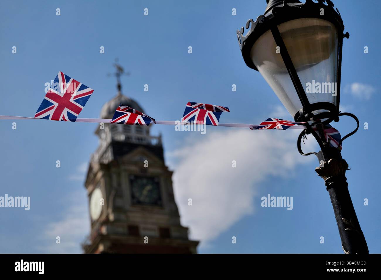Union Jack Bunting flags tied to an old lamp post celebrating VE Day ...